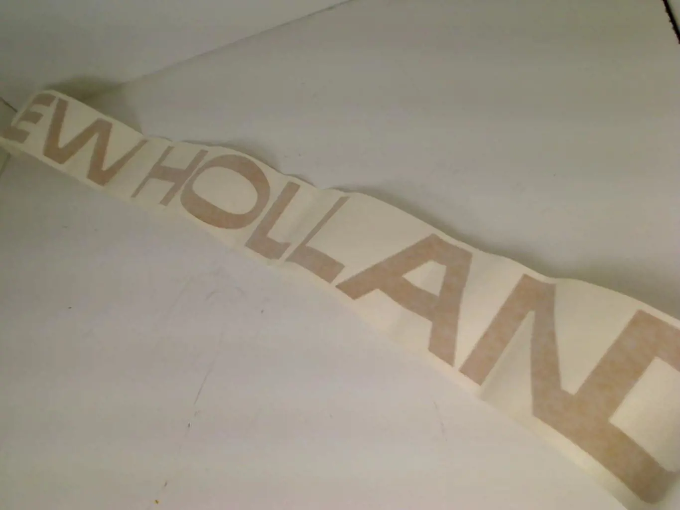 New Holland #86521674 DECAL NH 40"